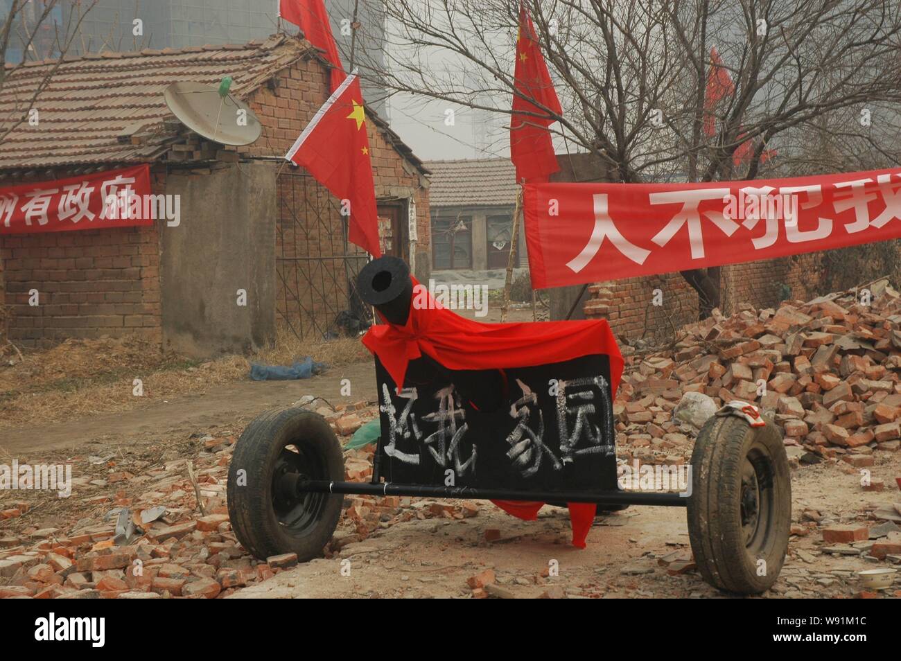 A homemade cannon to be used to resist forcible house demolition is ...
