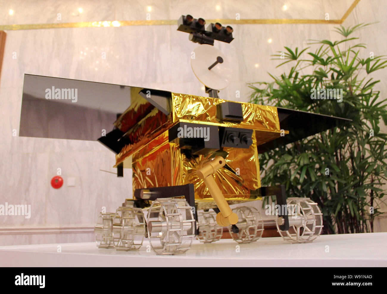 A model of Chinas first moon rover is displayed at a press conference ...
