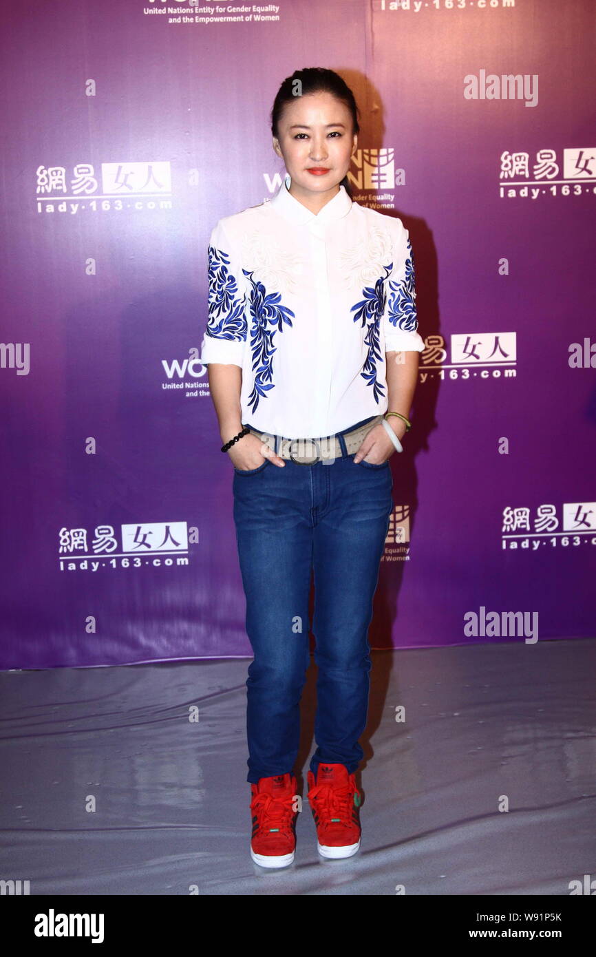 Chinese director Li Yu poses as she arrives for the 3rd Women Media ...