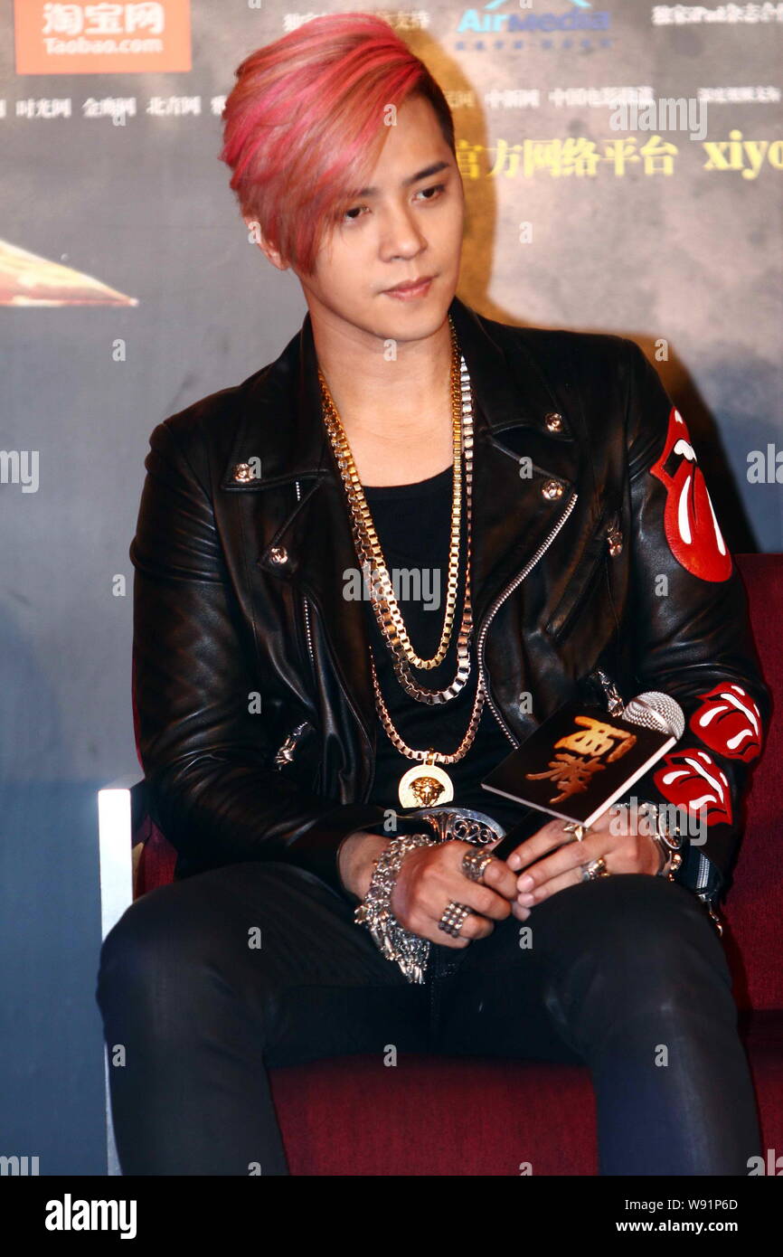 Taiwanese singer Show Lo looks on during a press conference for the ...