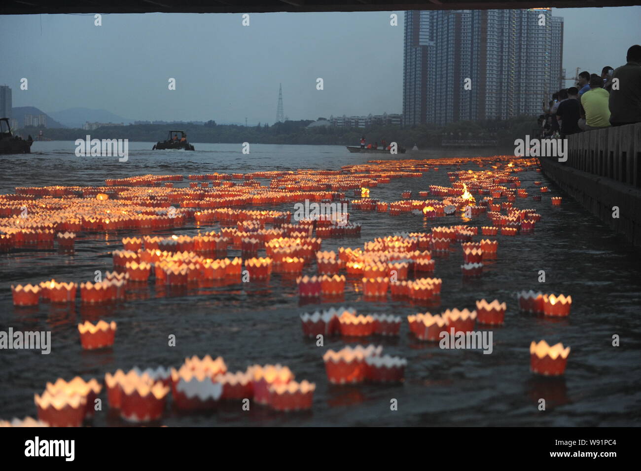 River lanterns float on the Songhua River in Jilin city, northeast ...