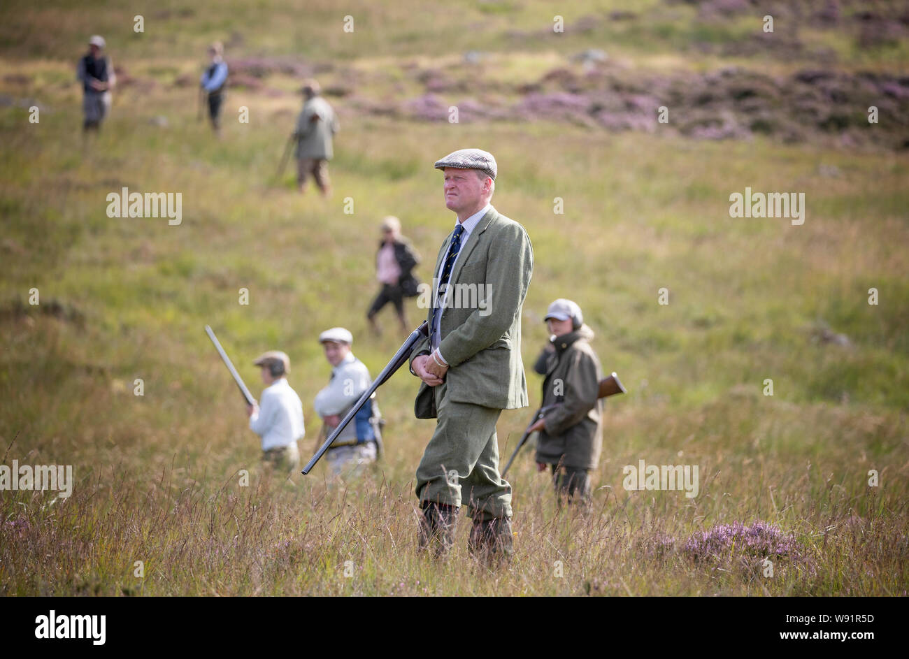Robin Leslie-Melville, a member of a shooting party on the moors at the ...