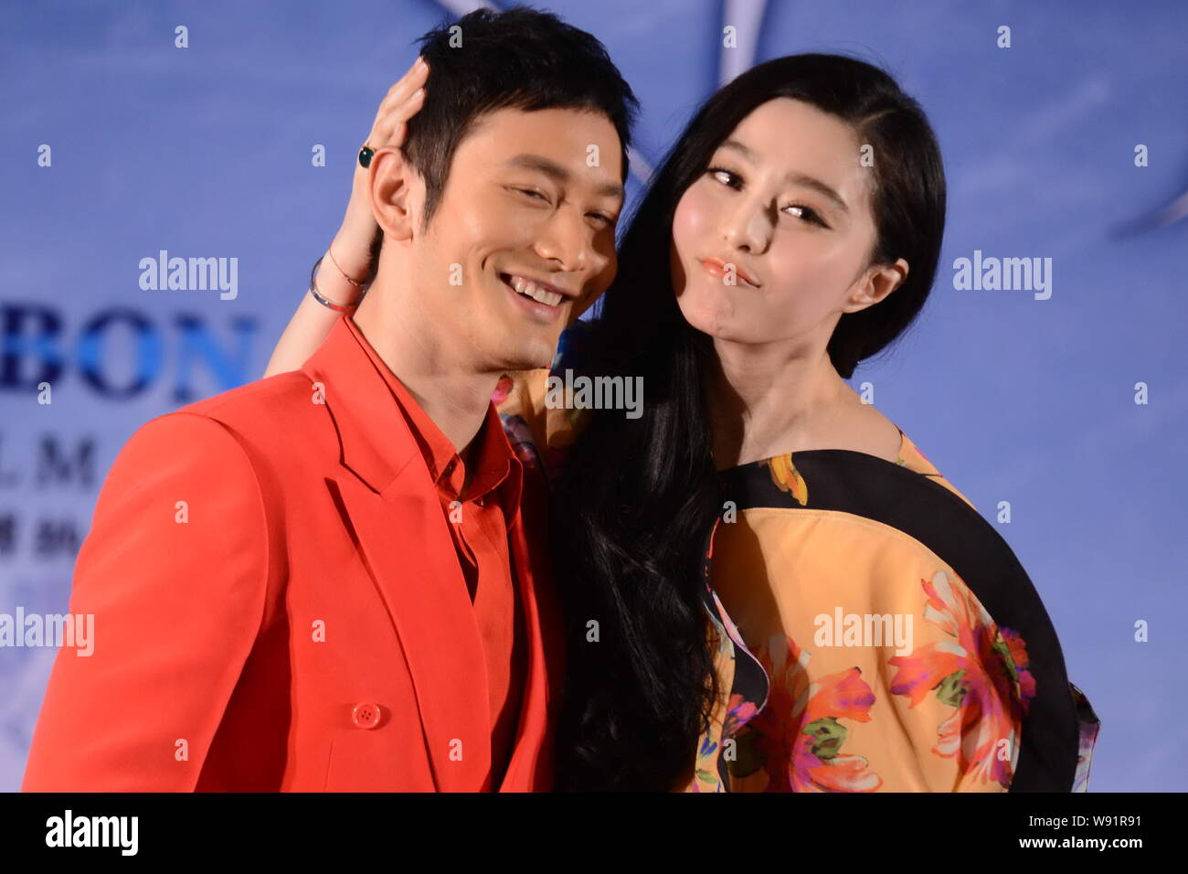 Chinese actress Fan Bingbing, right, and actor Huang Xiaoming pose at a ...