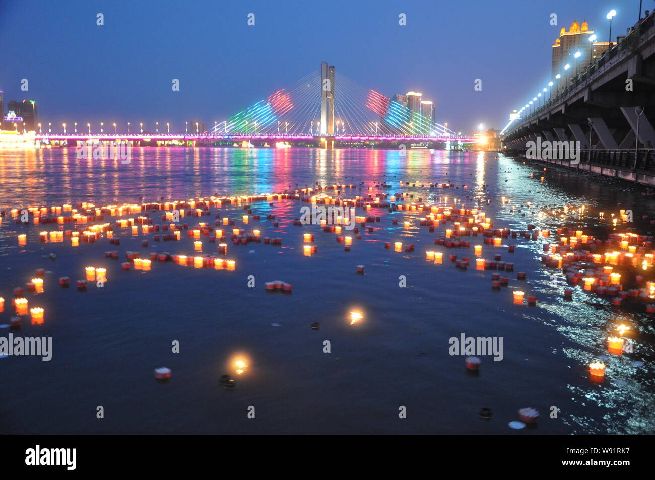 Night view of river lanterns floating on the Songhua River in Jilin ...