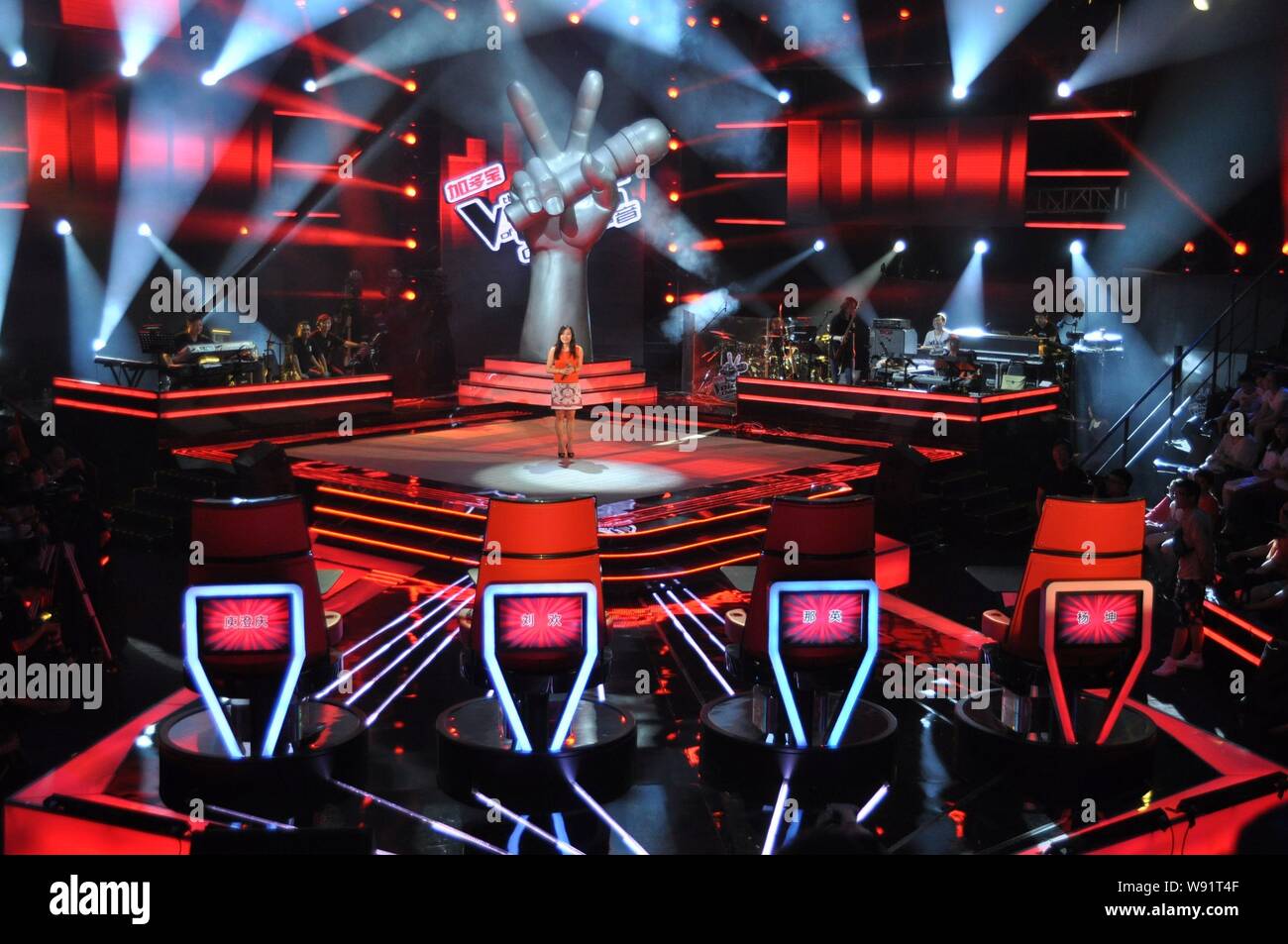 --FILE--A contestant stands on the stage during an episode of the ...