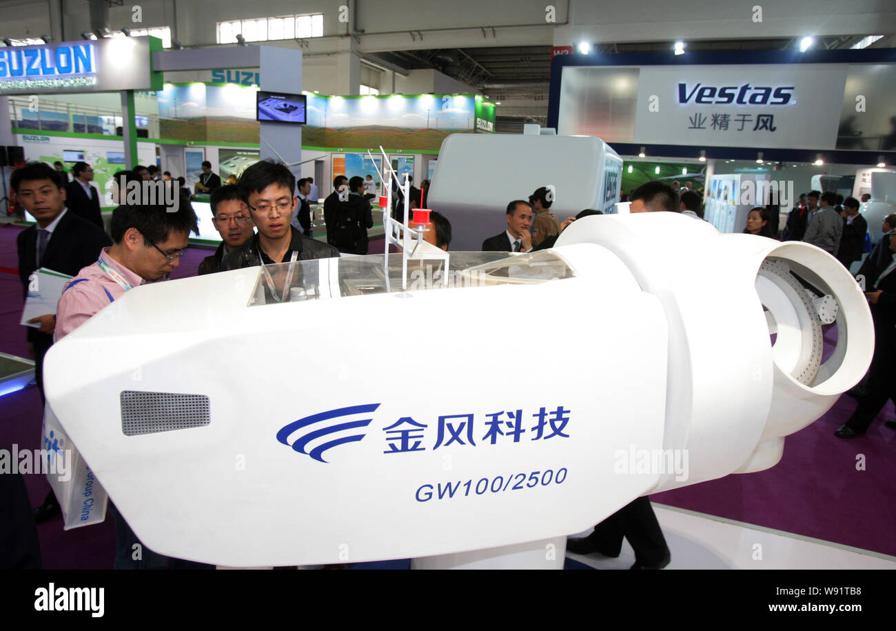 --FILE--Visitors look at a model of the Goldwind GW100/2500 wind ...