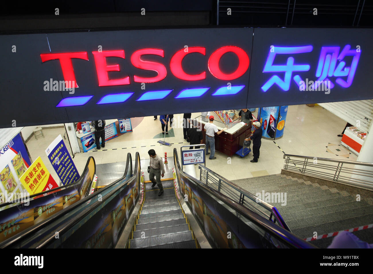 --FILE--Customers are shopping at a nearly empty Tesco supermarket soon ...