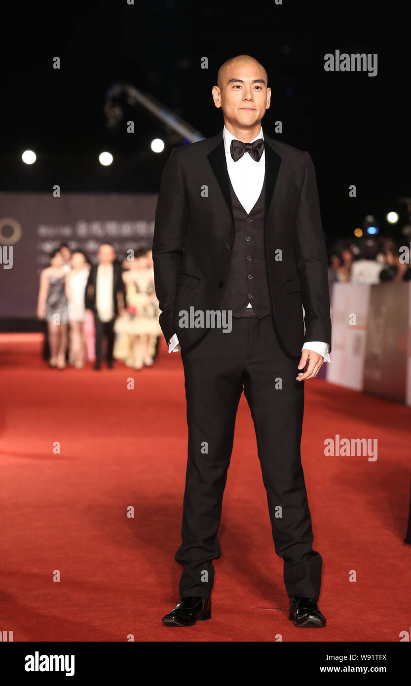 Taiwanese actor Eddie Peng poses on the red carpet as he arrives at the ...