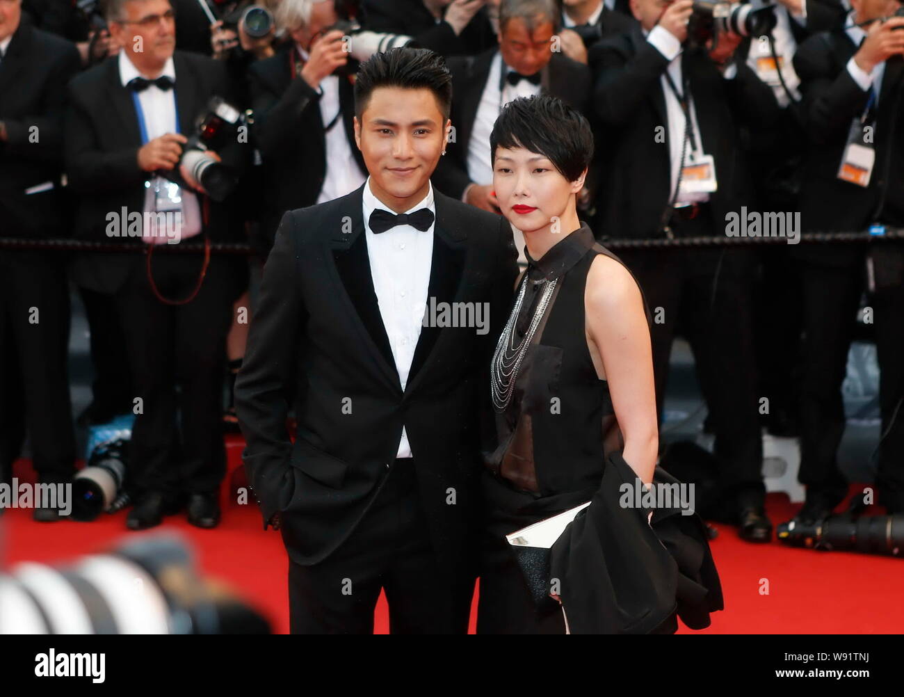 Chinese actor Chen Kun, left, and director Liu Yunwen pose on the red ...