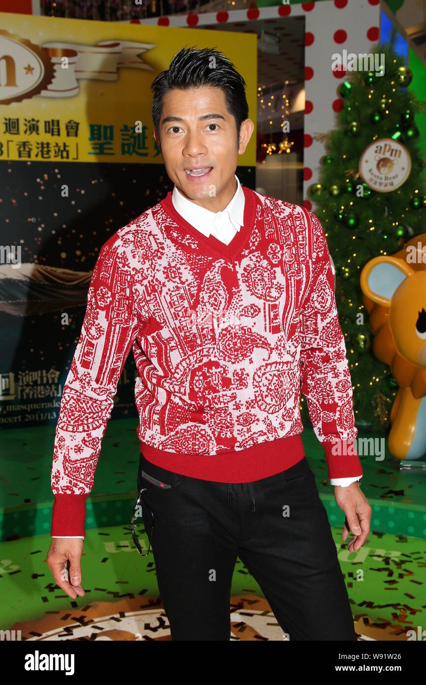 Hong Kong singer and actor Aaron Kwok speaks at a signing event for his ...