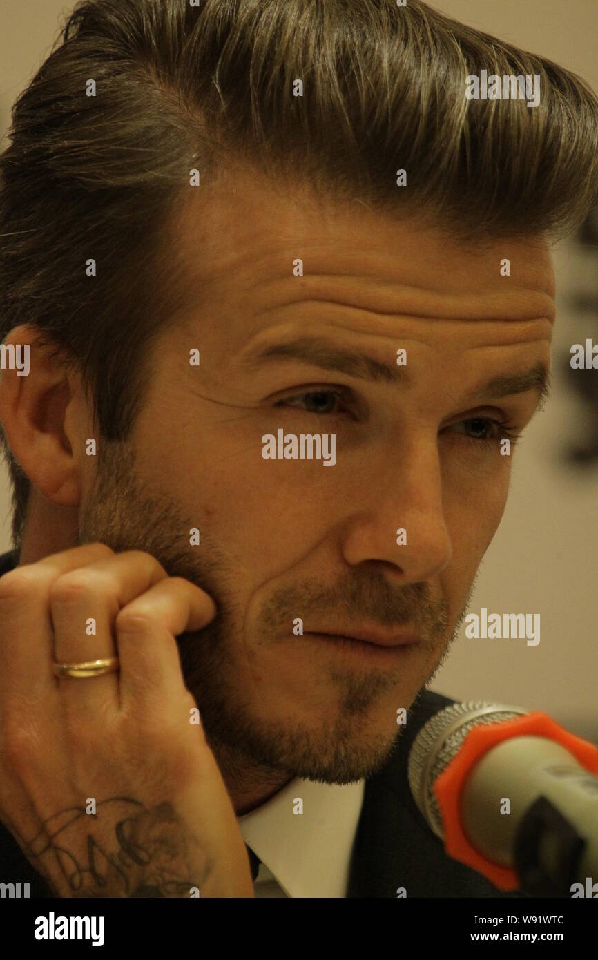 English soccer superstar David Beckham reacts during a press conference ...