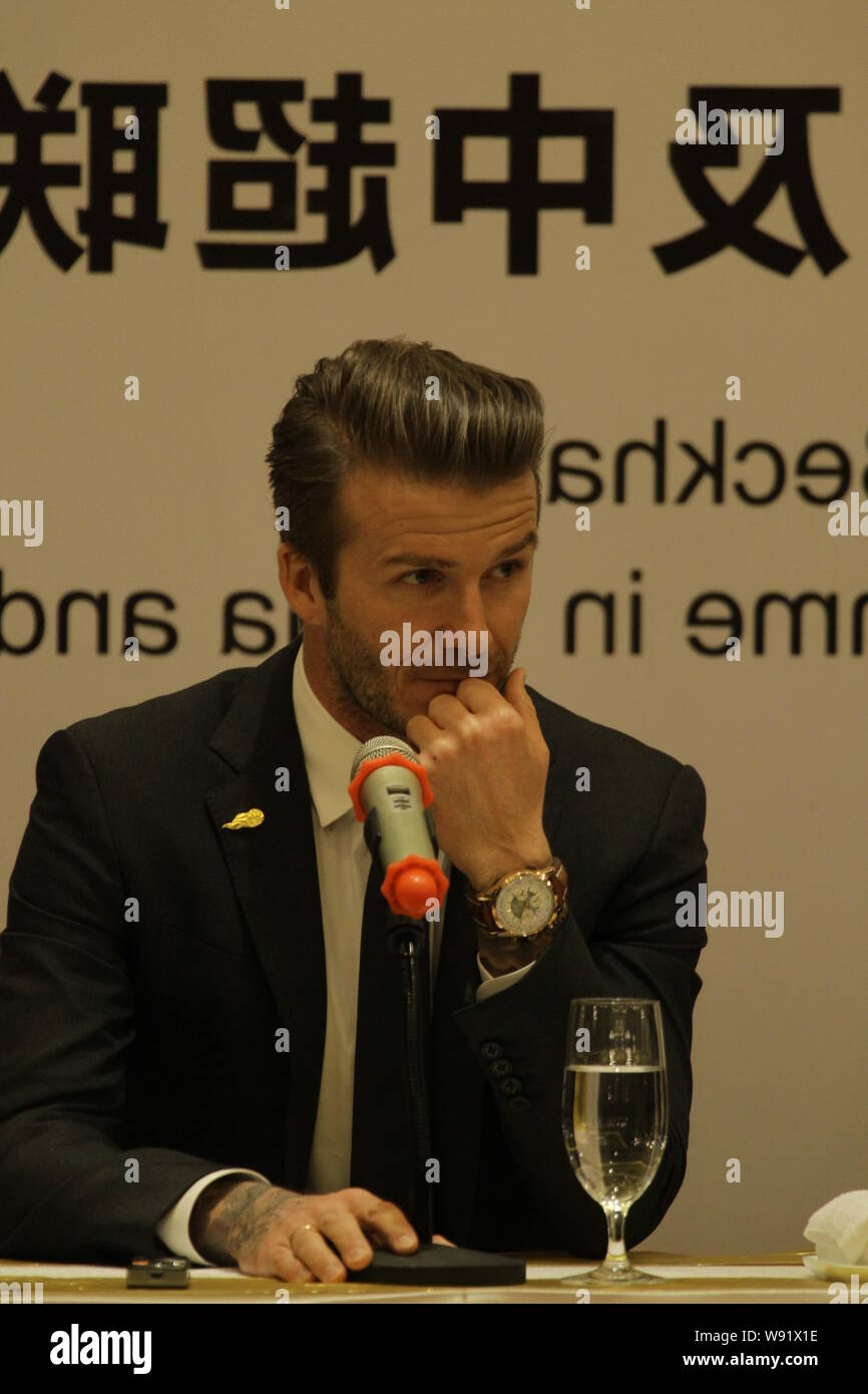English soccer superstar David Beckham reacts during a press conference ...
