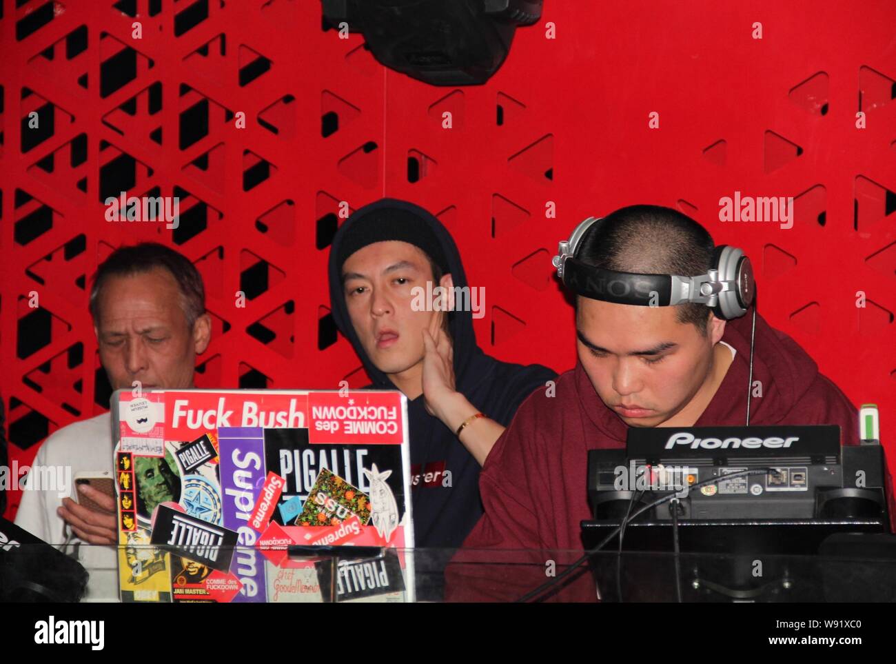 Hong Kong singer and actor Edison Chen (center) attends a party in the ...