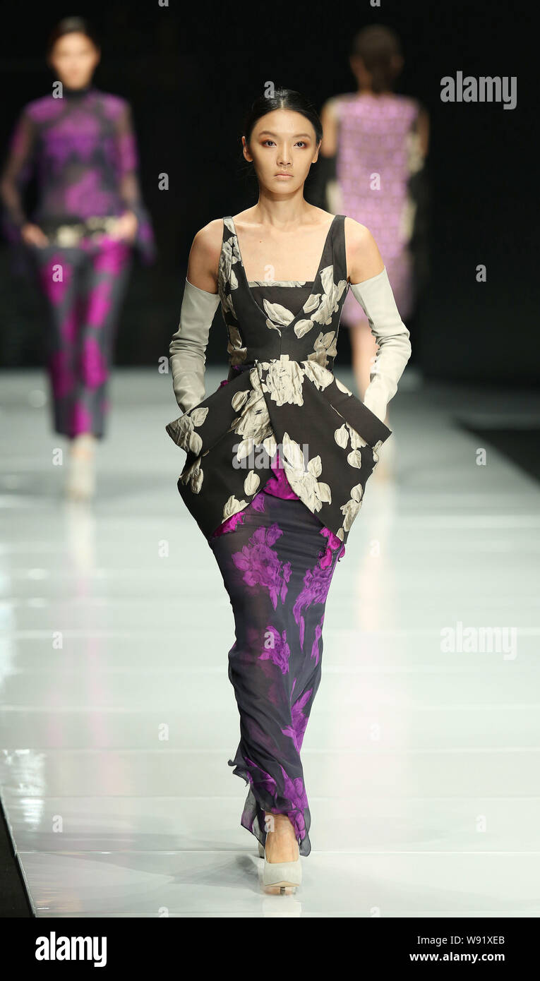 A model displays a new creation designed by Vera Wang at her fashion ...