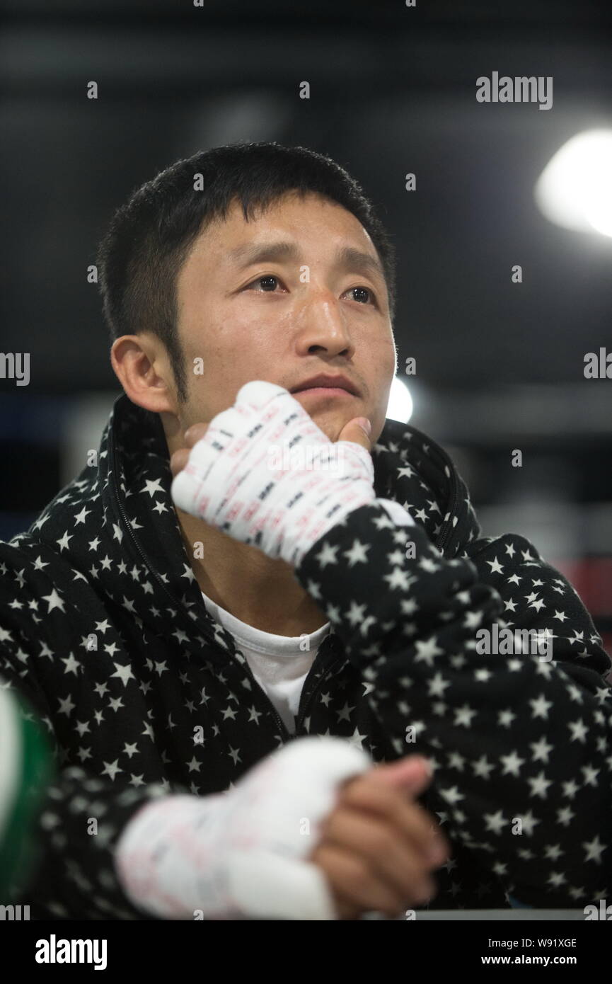 Zou Shiming, double Olympic boxing gold medallist, thinks during an ...