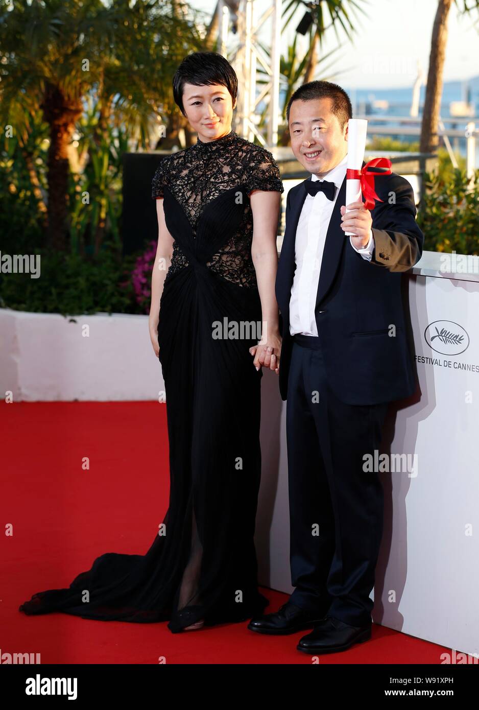Chinese director Jia Zhangke, right, poses with his actress wife Zhao ...