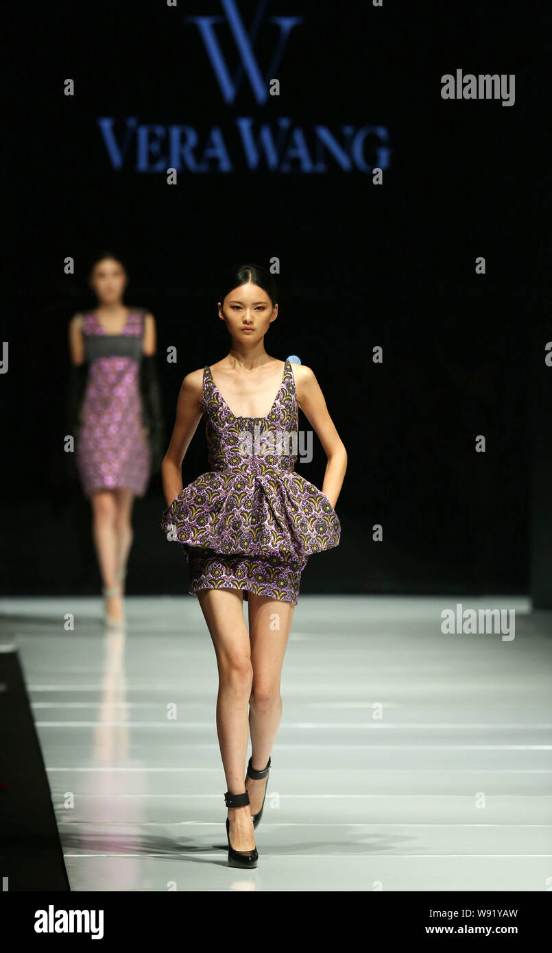 A model displays a new creation designed by Vera Wang at her fashion ...