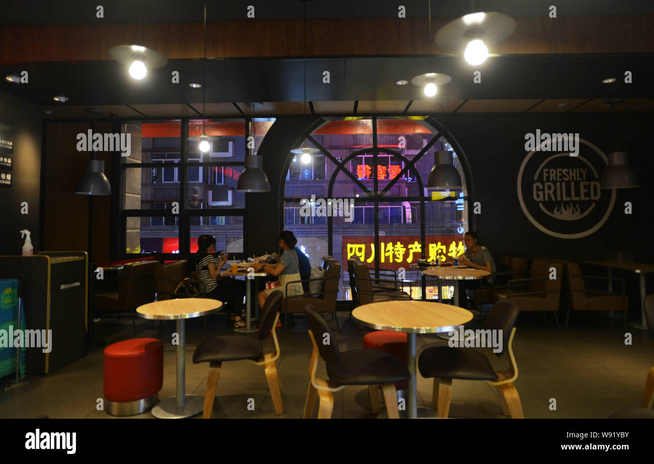 Chinese customers eat food at a fastfood restaurant of Burger King in ...
