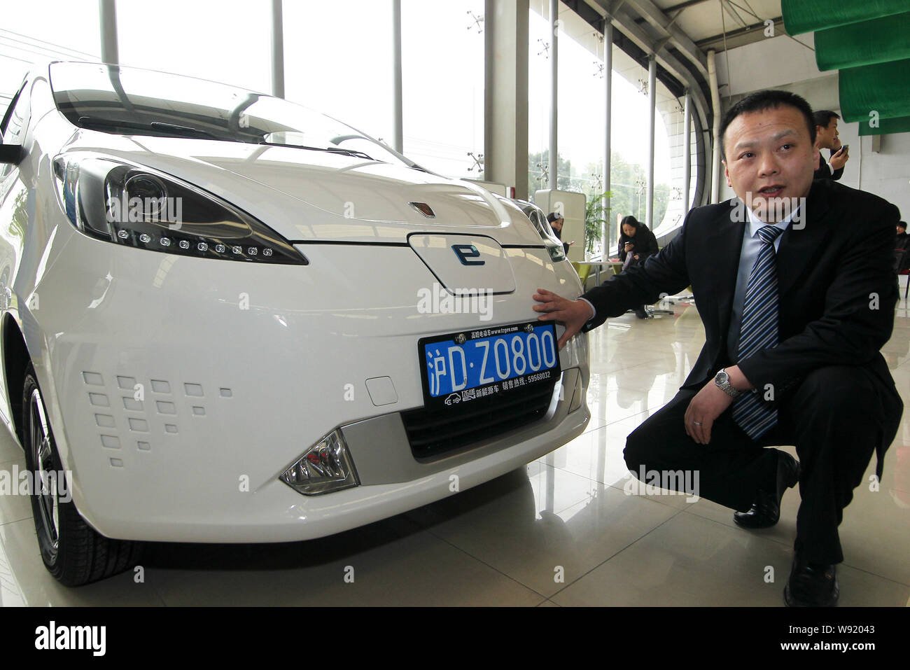 Mr. Qian, owner of the first free car plate for new energy vehicles in ...