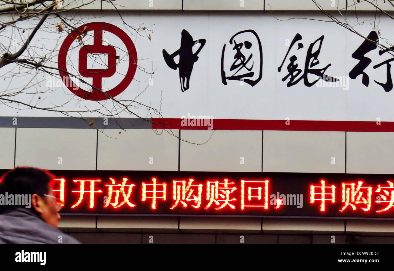 --FILE--A pedestrian stands in front of a branch of Bank of China (BOC ...