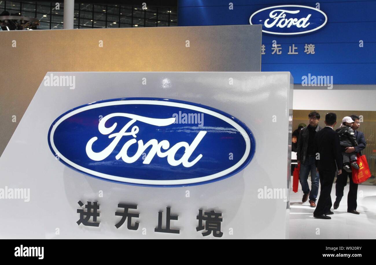--FILE--People visit the stand of Ford during an automobile exhibition ...