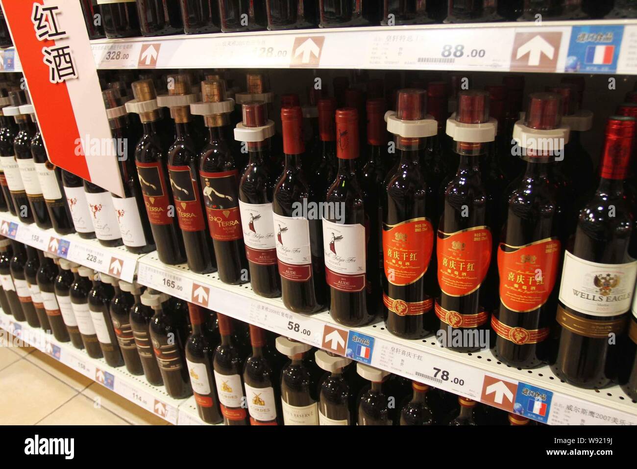 --FILE--Bottles of red wine imported from France are displayed for sale ...