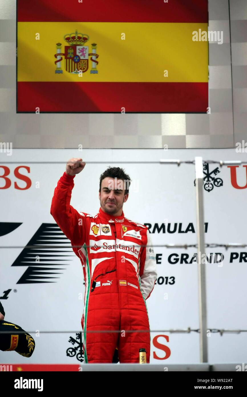 Spanish F1 driver Fernando Alonso of Ferrari celebrates after winning ...