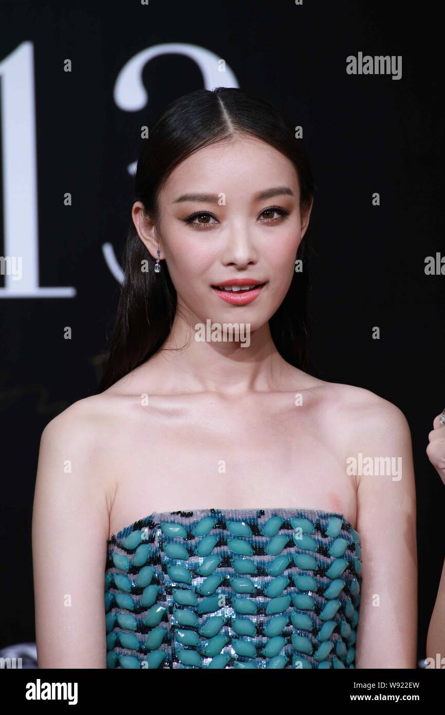 Chinese actress Ni Ni poses on the red carpet as she arrives at the ...