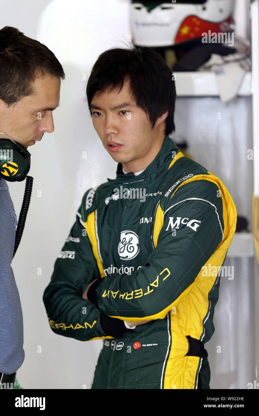 Chinese racer Ma Qinghua of Caterham reacts during the first practice ...