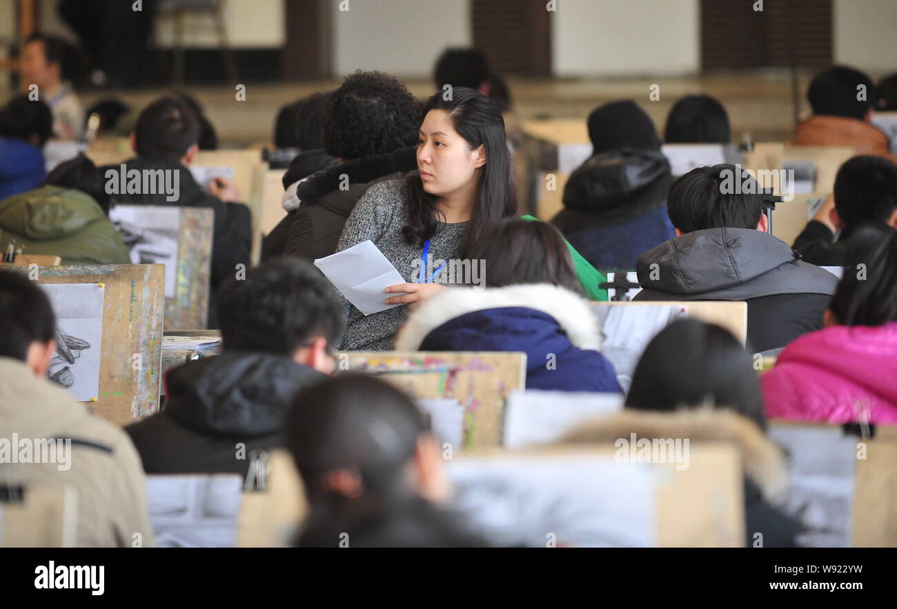 Exam invigilator hi-res stock photography and images - Alamy