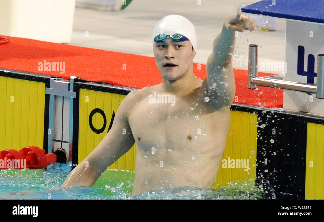 Chinese Olympic swimming champion Sun Yang poses in a pool after ...