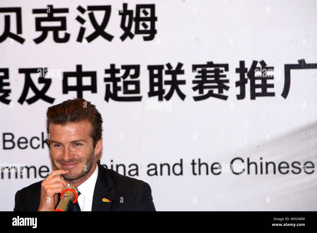 English soccer superstar David Beckham smiles during a press conference ...