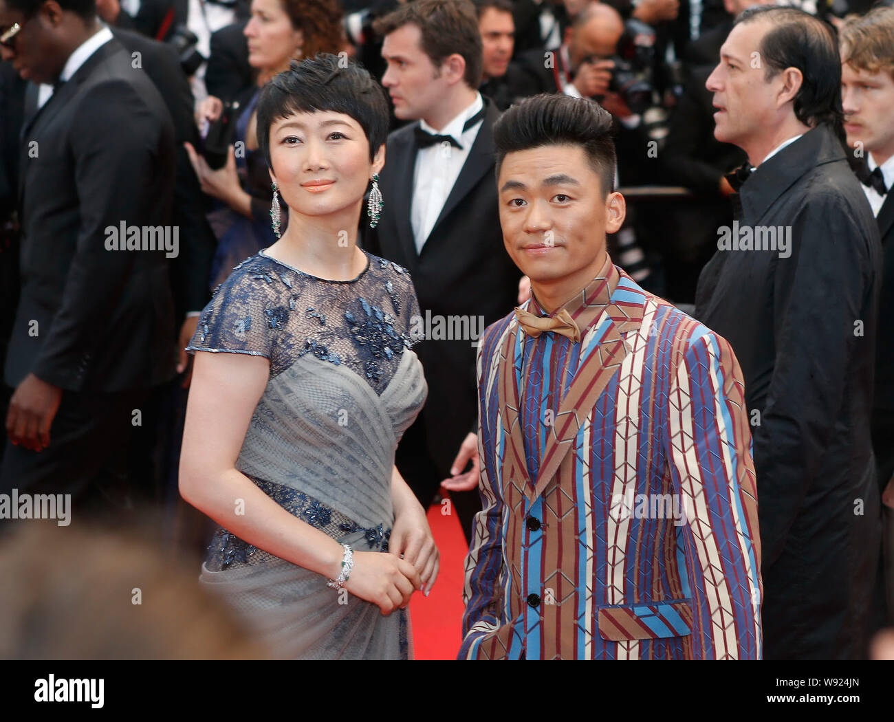 Chinese actress Zhao Tao, left, and actor Wang Baoqiang pose on the red ...