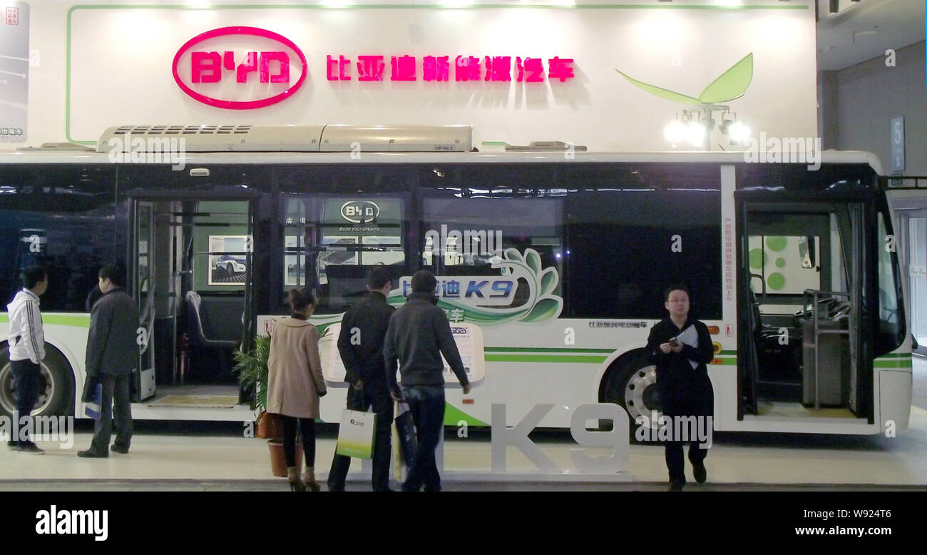 --FILE--Visitors look at a BYD K9 electric bus during an exhibition in ...