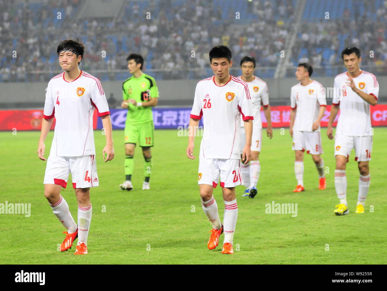 Chinese national soccer team players Zhao Peng, right, Wu Lei walk on ...