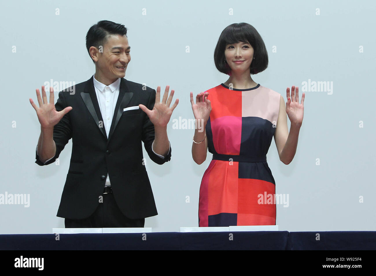 Hong Kong actor Andy Lau, left, Taiwanese model and actress Lin Chi ...