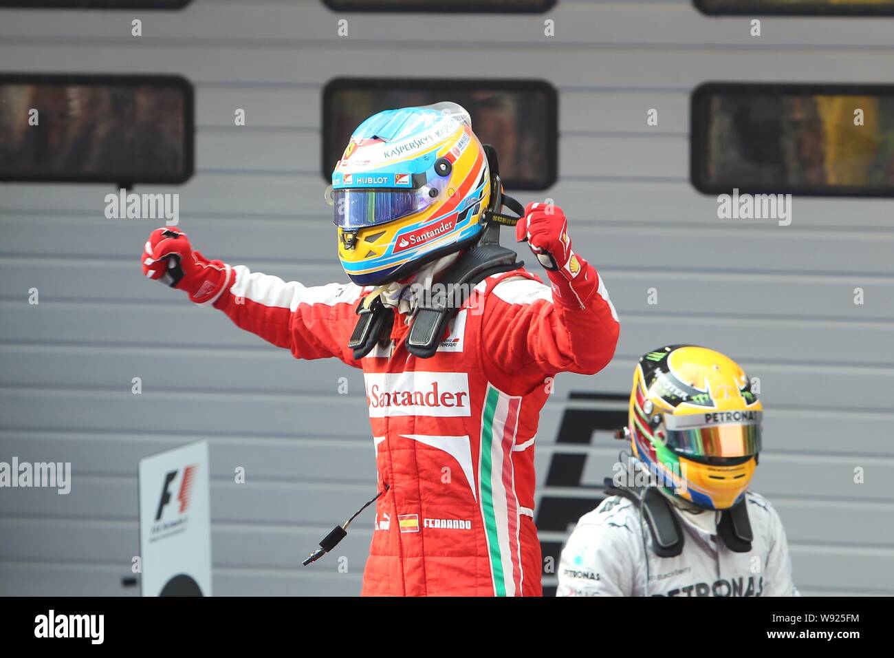 Spanish F1 driver Fernando Alonso of Ferrari celebrates after winning ...