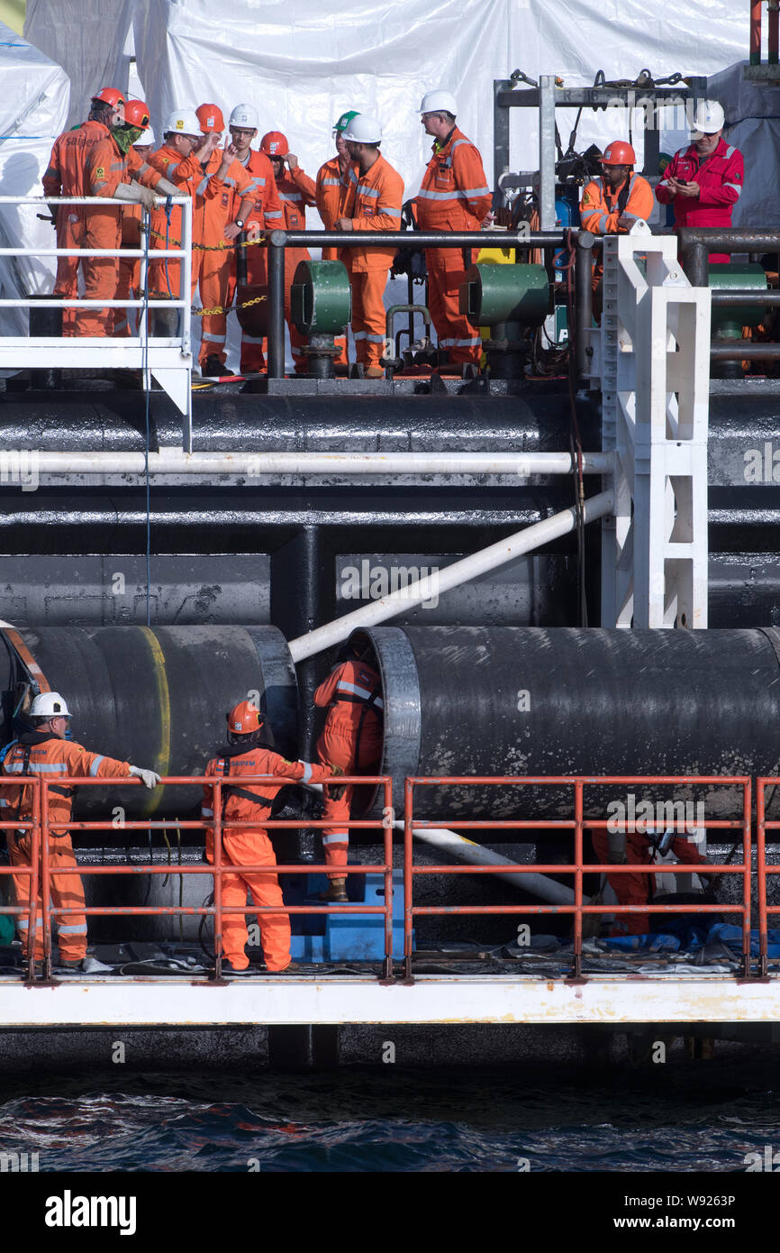 Sassnitz, Germany. 12th Aug, 2019. On a platform at the pipeline laying ...