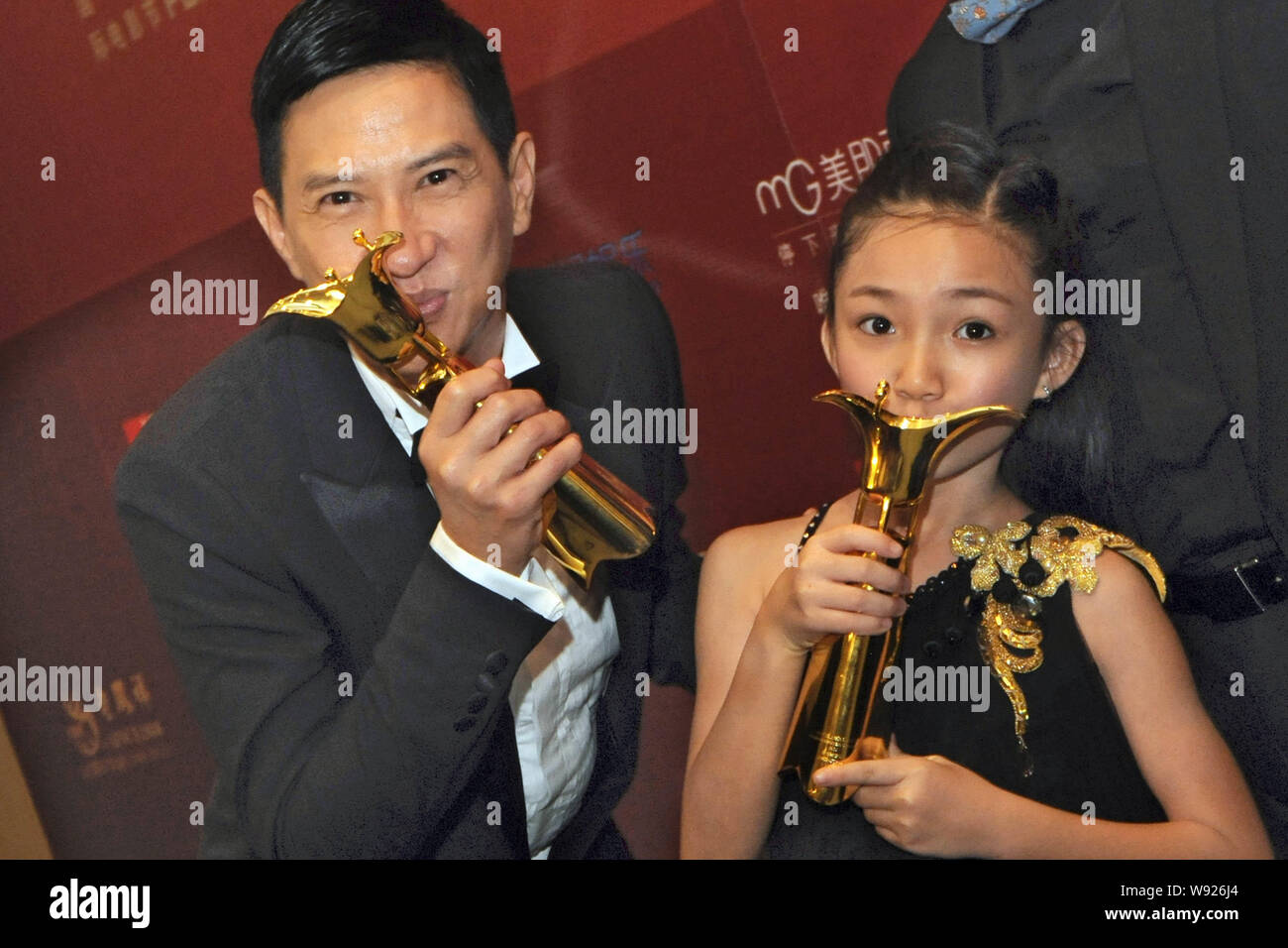 Hong Kong actor Nick Cheung Ka-fai, left, and 10-year-old Malaysian ...