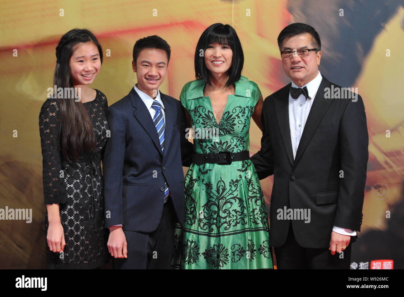 --FILE--U.S. Ambassador to China Gary Locke, right, poses with his ...