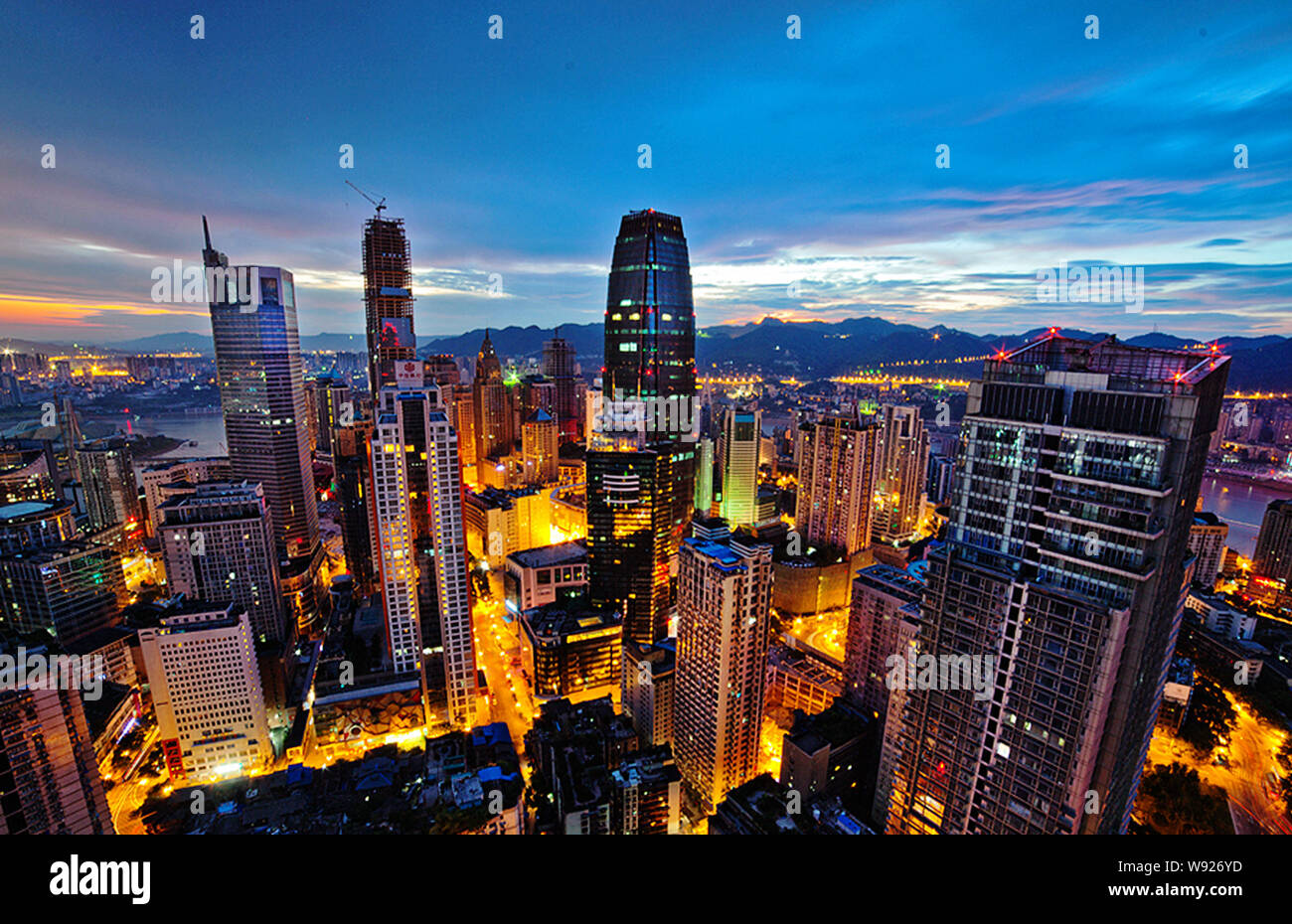 Aerial nightview of skyscrapers and high-rise buildings in Chongqing ...