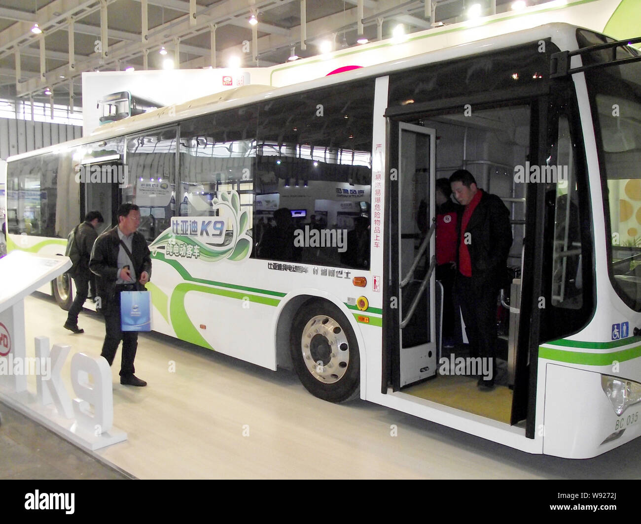 --FILE--Visitors try out a BYD K9 electric bus during an exhibition in ...
