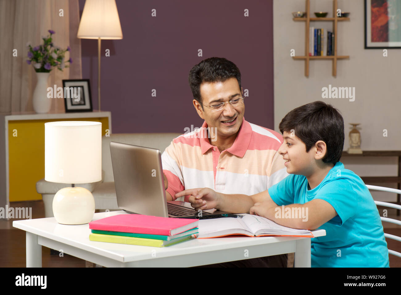 Laptop teaching hi-res stock photography and images - Alamy