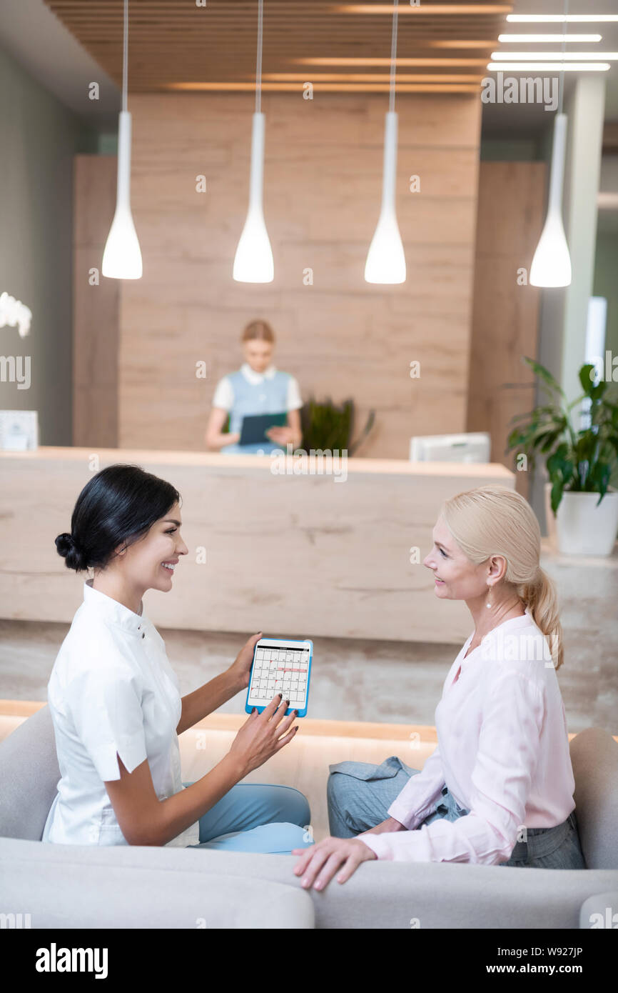 Fixing an appointment hi-res stock photography and images - Alamy