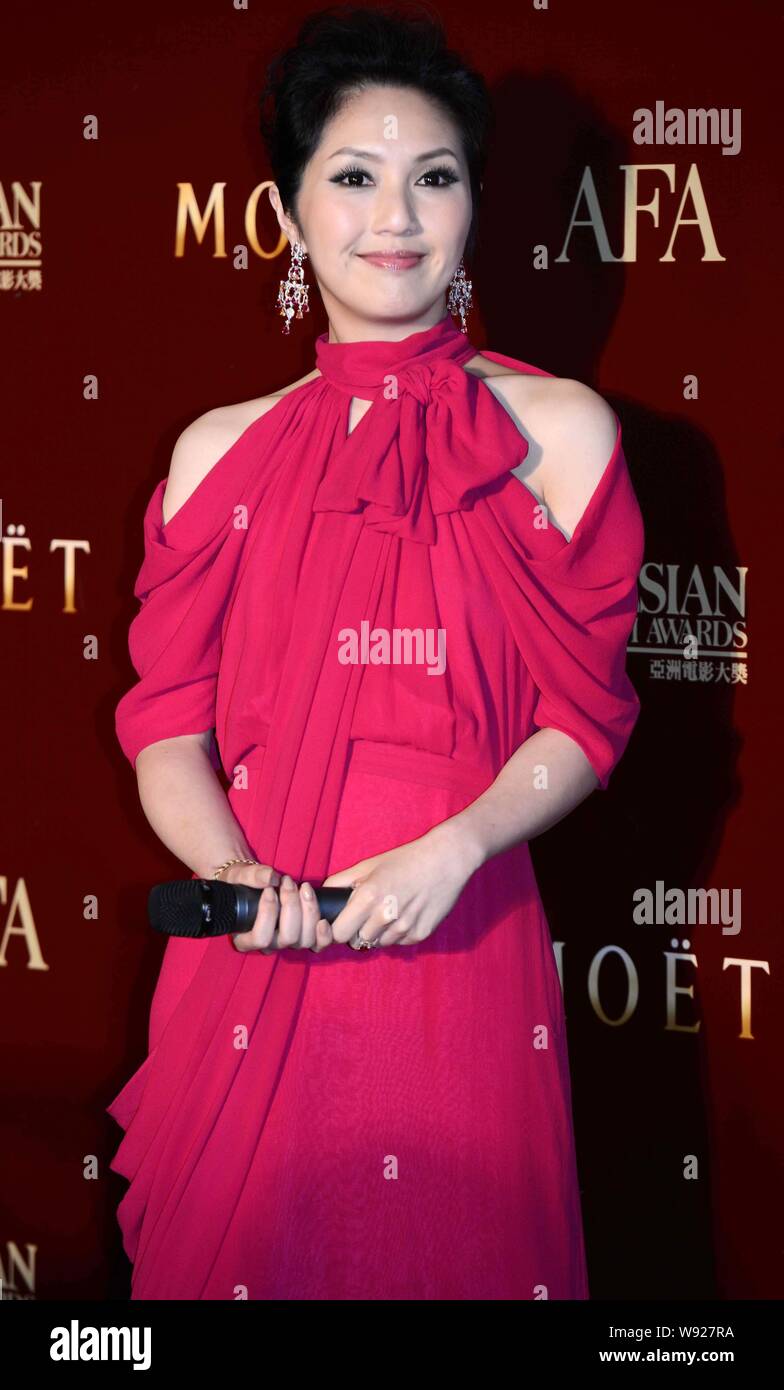 Hong Kong actress Miriam Yeung poses on the red carpet as she arrives ...