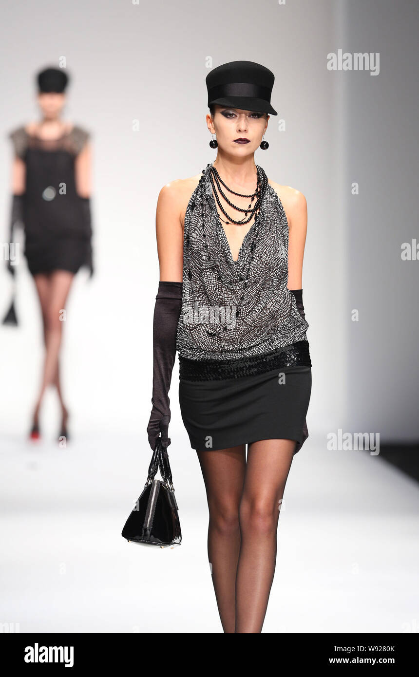 A model displays a new creation by designer Renato Nucci at his Renato ...