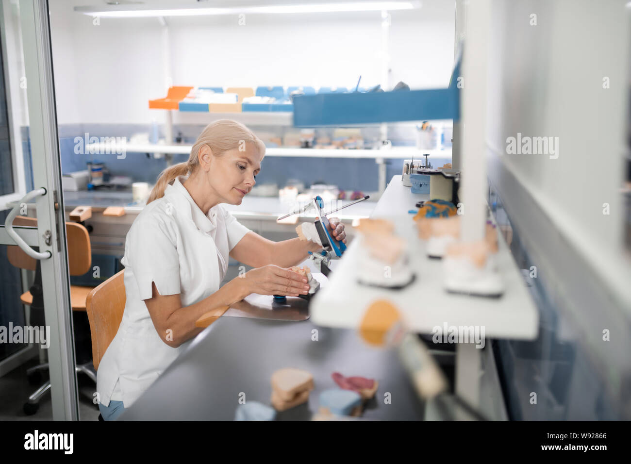 Admiring his work hi-res stock photography and images - Alamy
