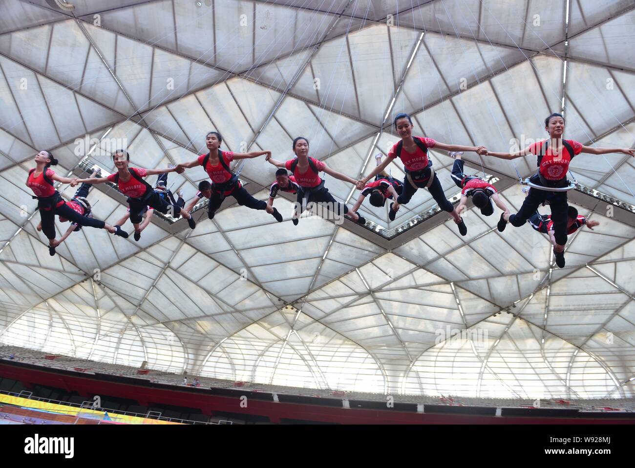 Chinese acrobats rehearse the wire performance at the Birds Nest for ...