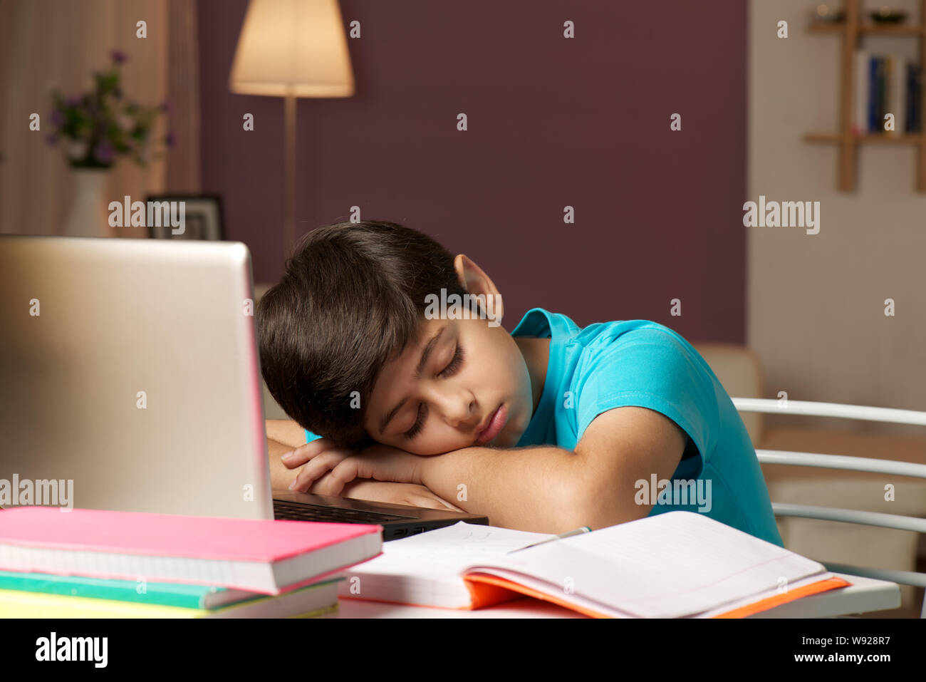 Boy sleeping on desk in hi-res stock photography and images - Alamy