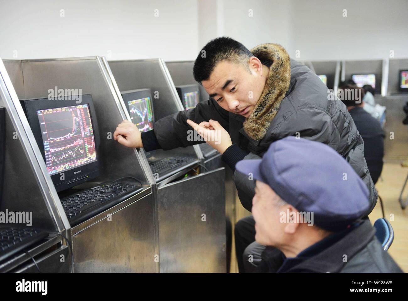 Chinese stock market rally hi-res stock photography and images - Alamy